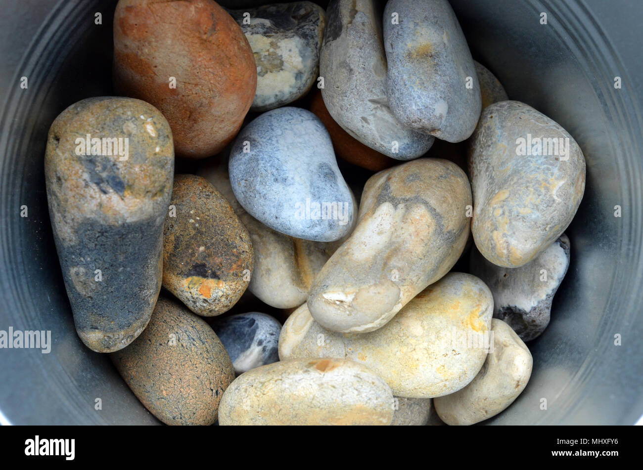 Bucket pebbles hi-res stock photography and images - Alamy