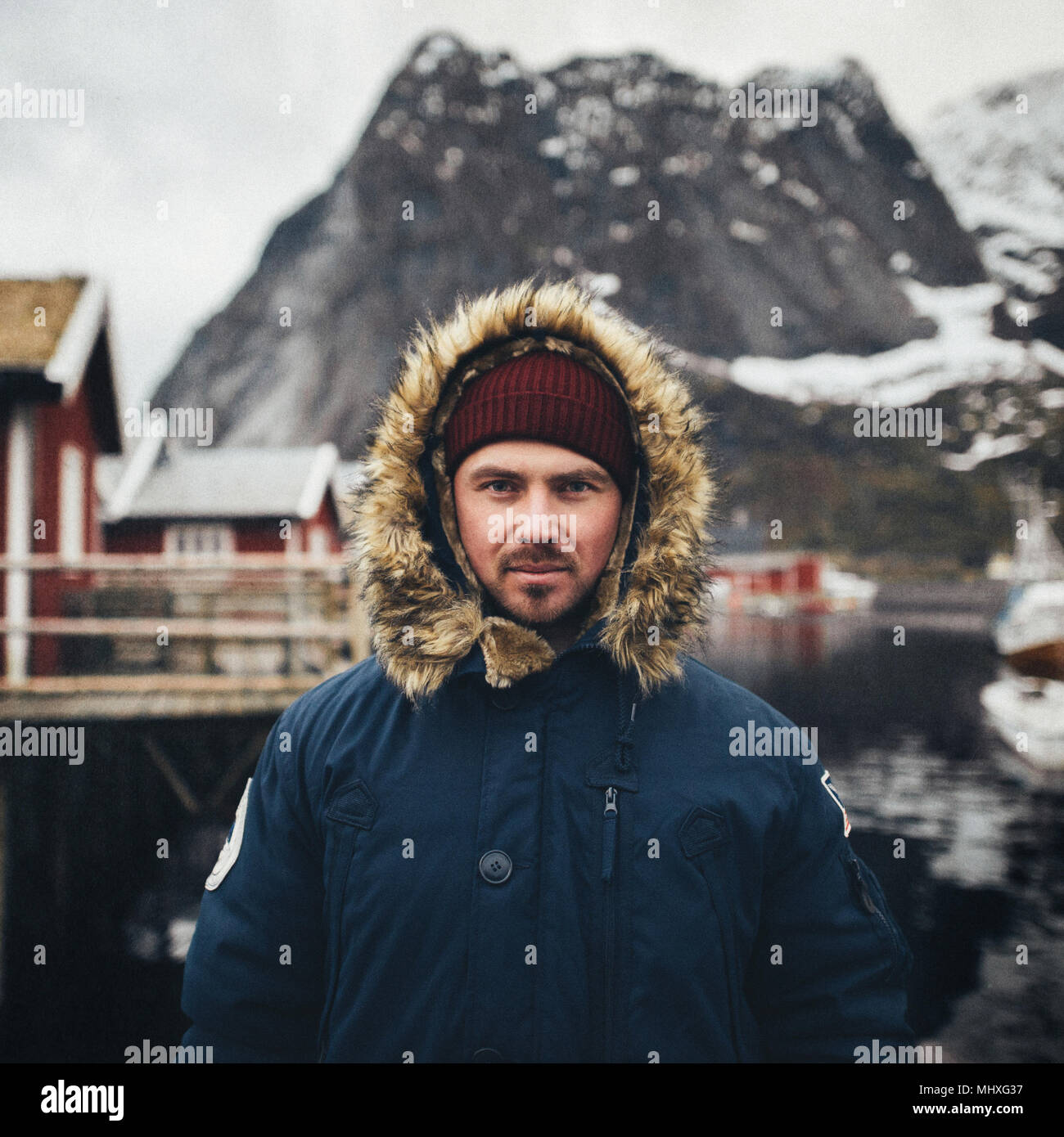 Traveler Man on bridge sightseeing Reine village in Norway lifestyle ... Traveler Man on bridge sightseeing Reine village in Norway lifestyle ...