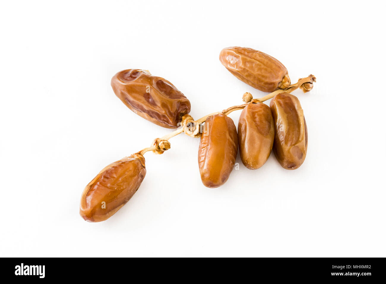 Dates isolated on white background Stock Photo - Alamy