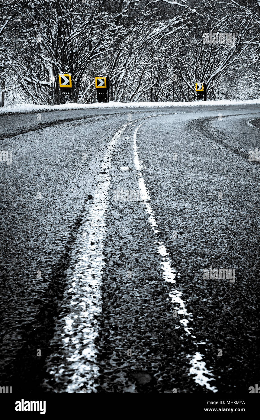 Chevron road bend sign hi-res stock photography and images - Alamy