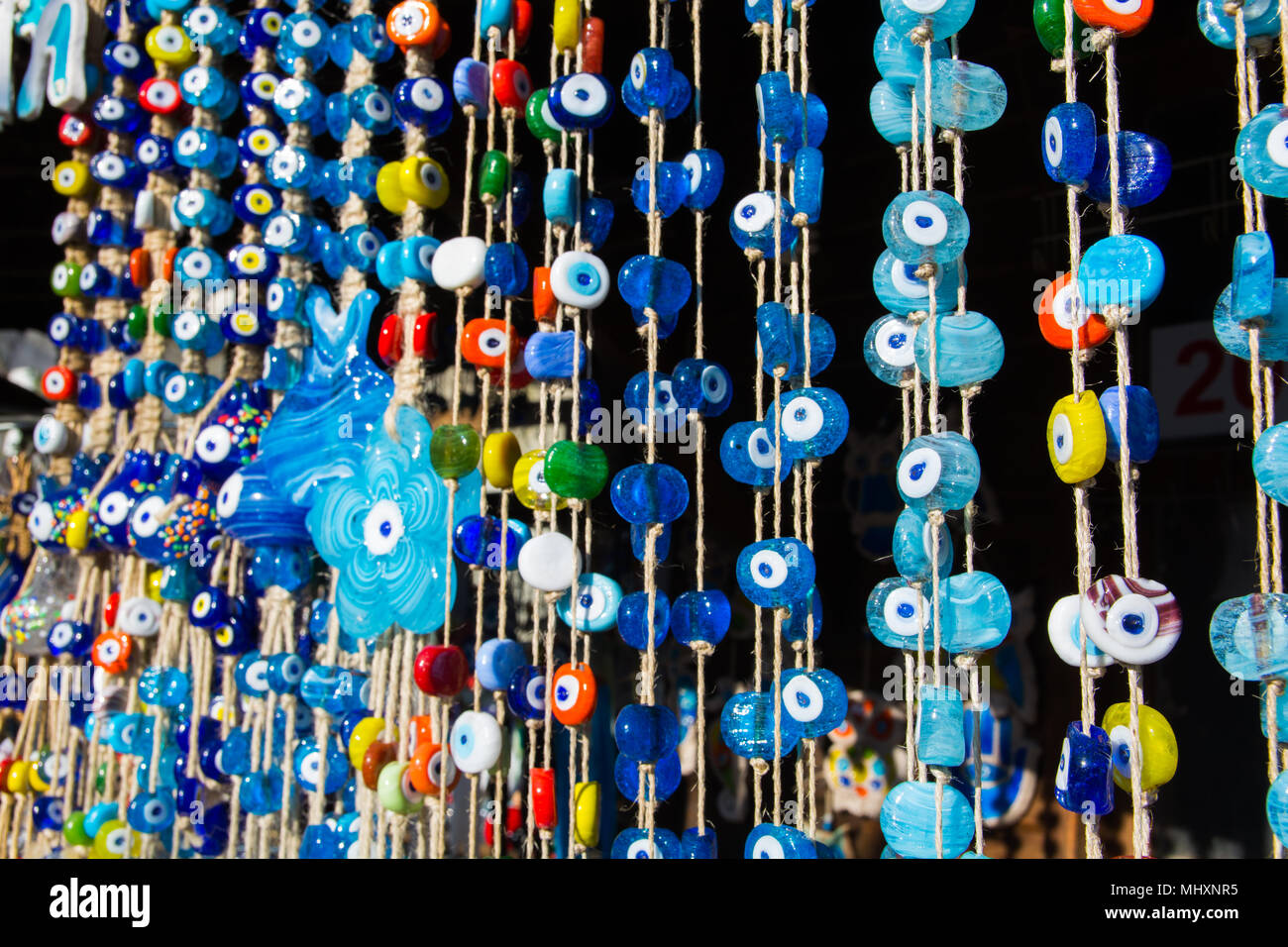 Evil eye bead souvenirs.broken glass is melted and shaped. In culture ...