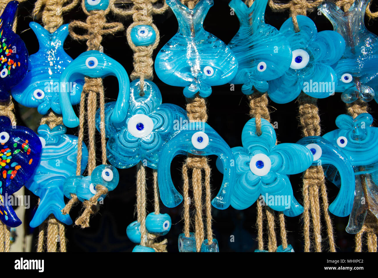 Evil eye bead souvenirs.broken glass is melted and shaped. In culture ...
