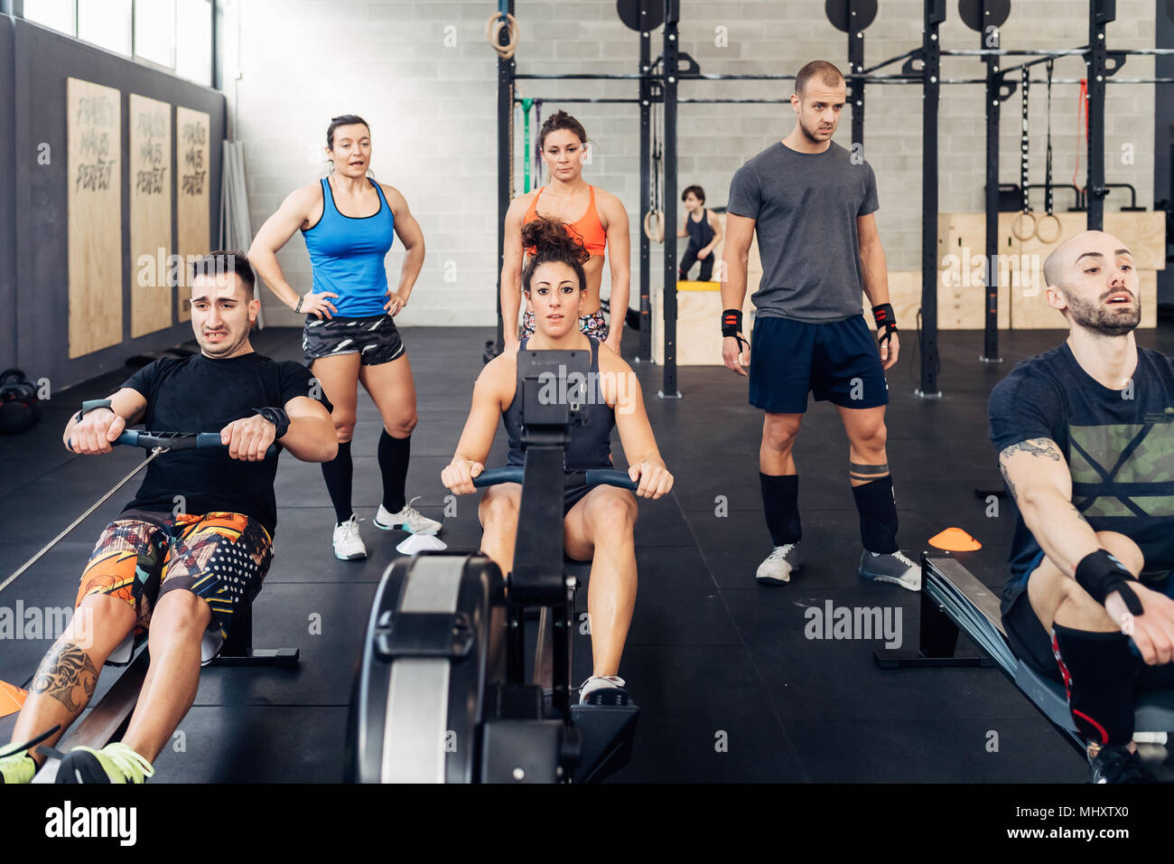 Man woman using rowing machine hi-res stock photography and images - Alamy