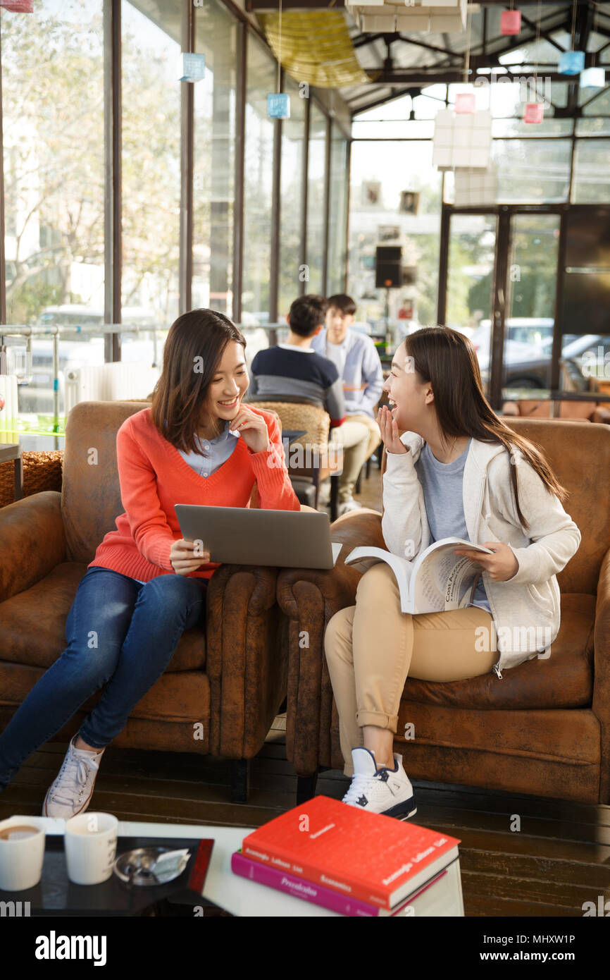 Two adults studying in library hi-res stock photography and images - Alamy