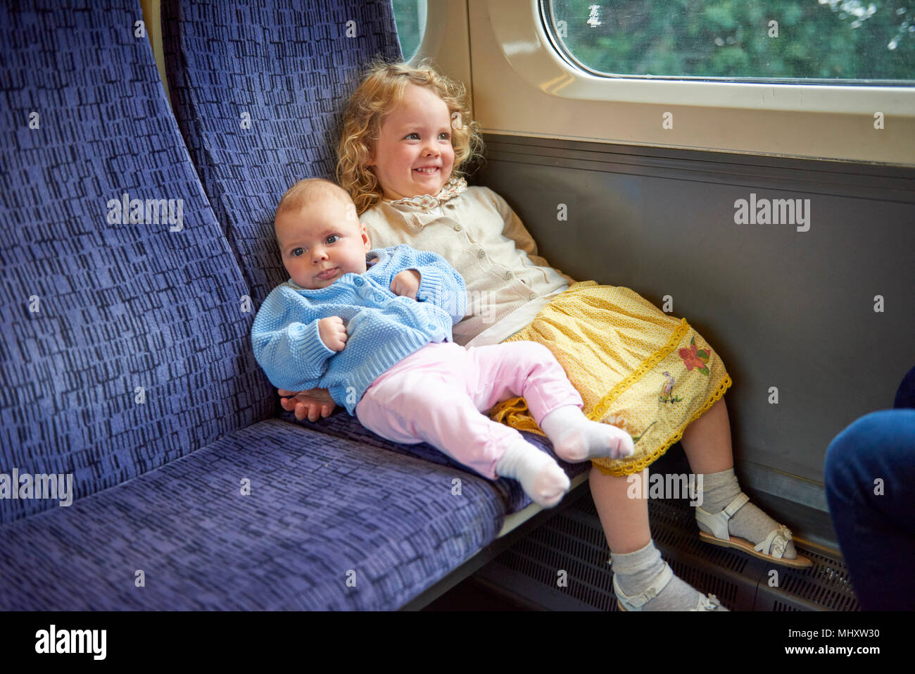 People sitting on train hi-res stock photography and images - Alamy
