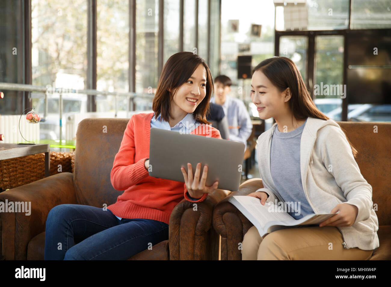 Two adults studying in library hi-res stock photography and images - Alamy