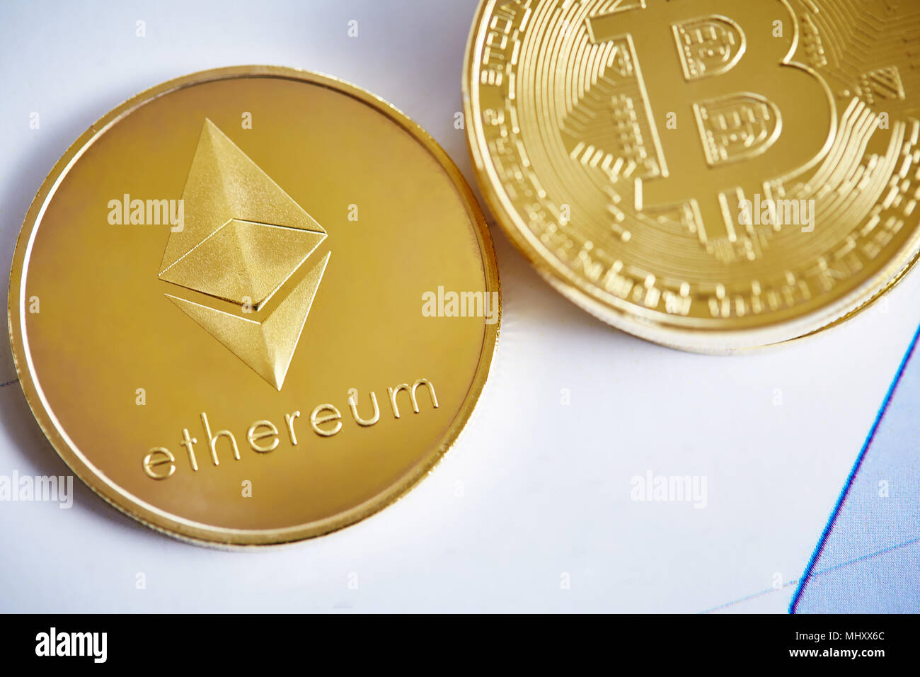 Bitcoin cryptocurrency on the chart background, close-up, shallow depth ...