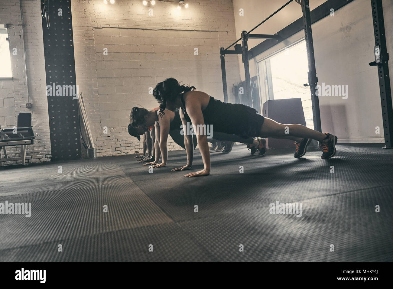 People exercising in gym, push ups Stock Photo - Alamy