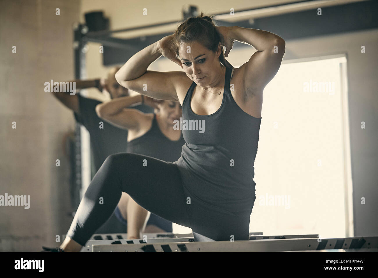 Hard working woman gym hi-res stock photography and images - Alamy