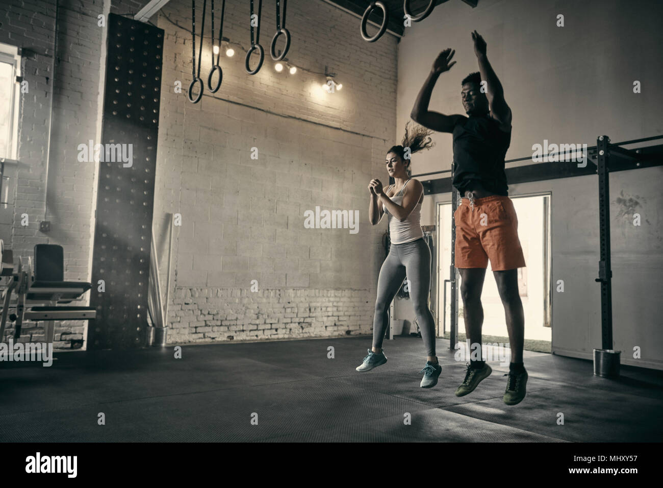 Jumping man woman hi-res stock photography and images - Alamy