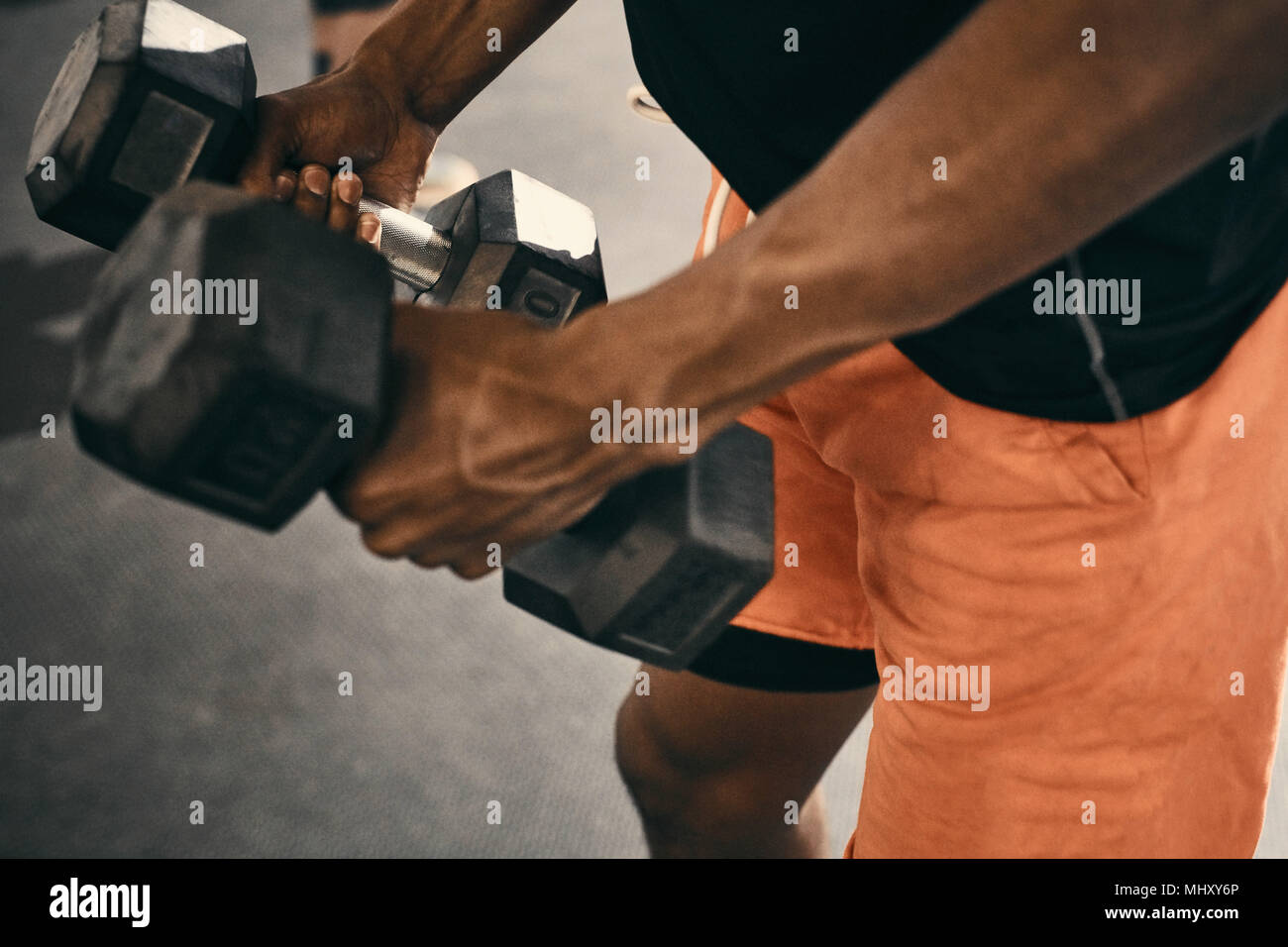 Using dumbbells hi-res stock photography and images - Alamy