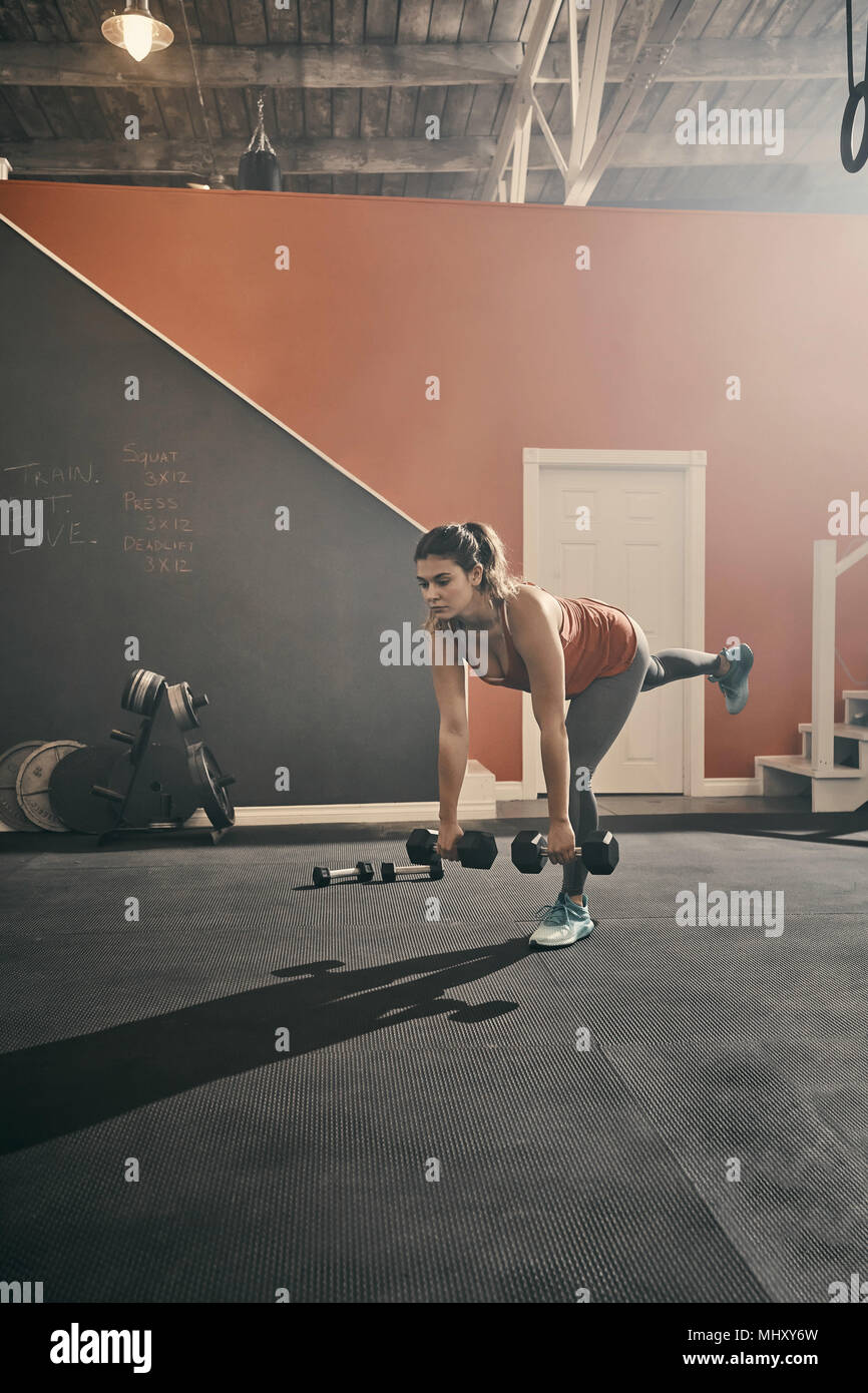 Exercising dumbbells woman in hi-res stock photography and images - Alamy