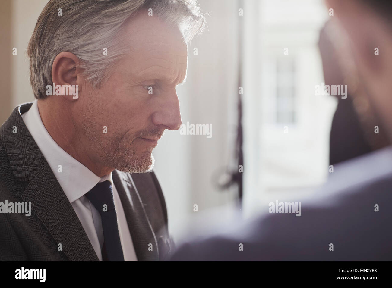 Senior businessman talking office hi-res stock photography and images ...