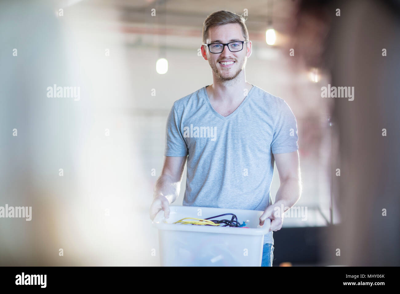 Man holding computer cables hi-res stock photography and images - Alamy