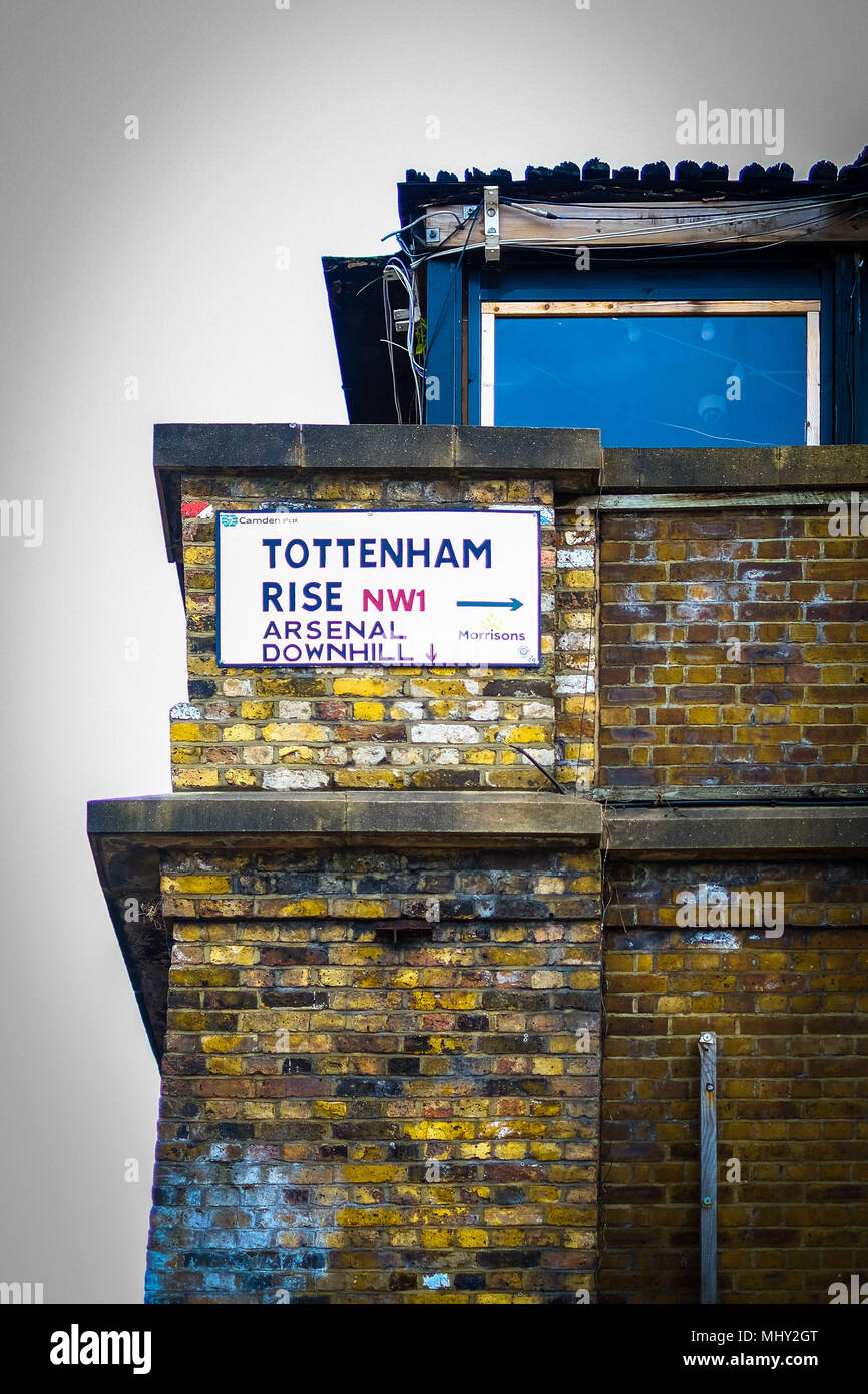 A street name sign for Tottenham, Rise with the added words Arsenal ...