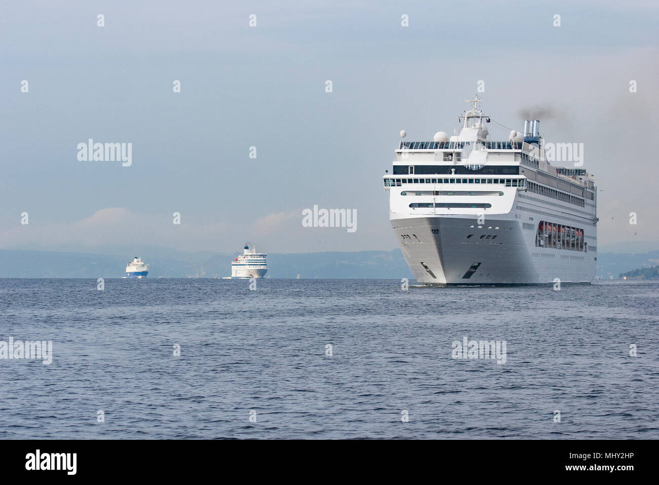 container vessel and ferry on high sea Stock Photo - Alamy