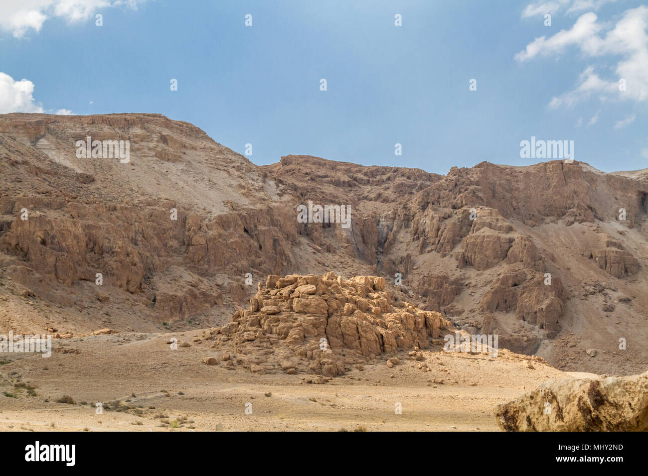 Landscape with caves of qumran near the dead sea hi-res stock ...