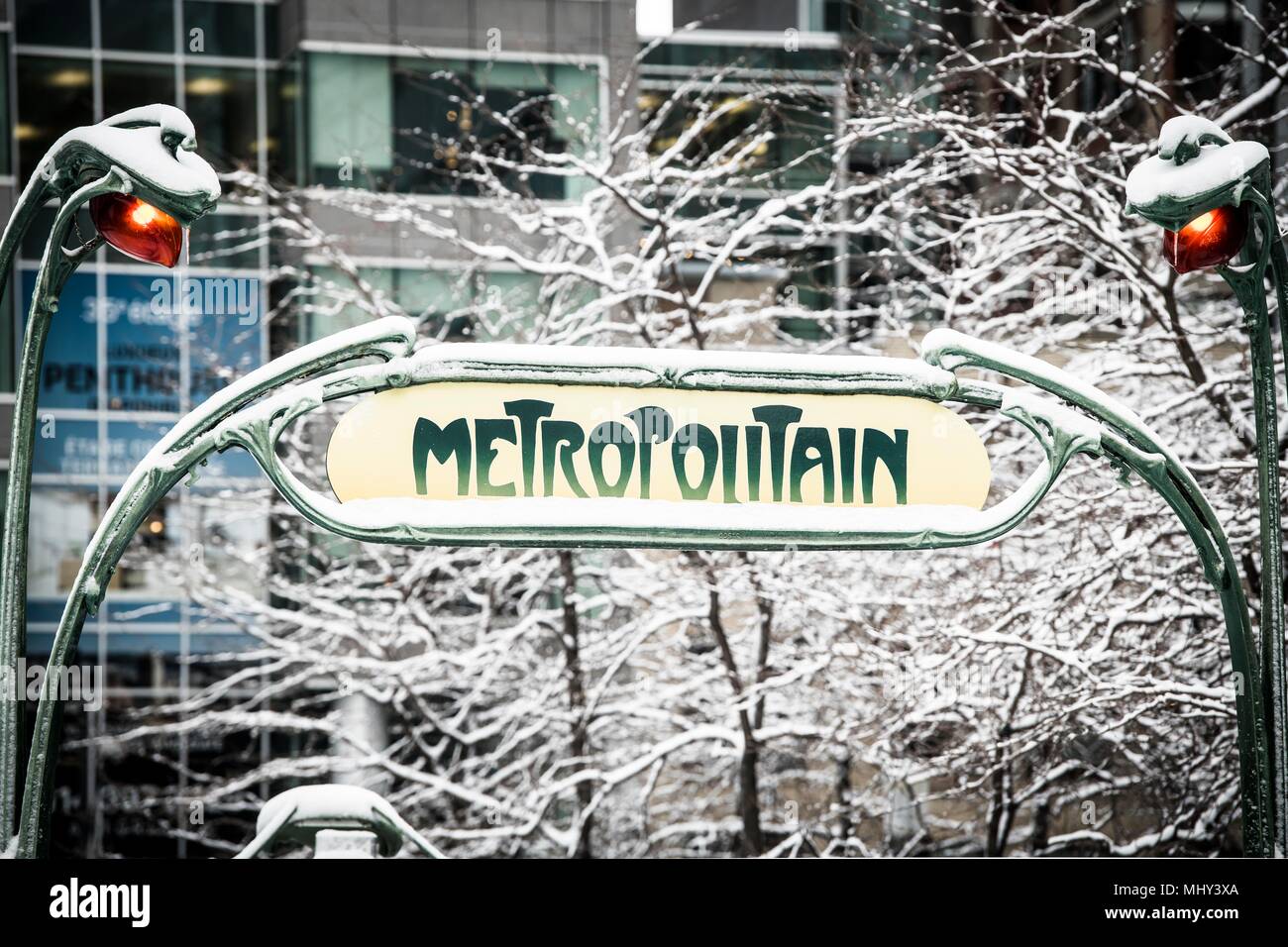 Snow covered Metro Metropolitain sign in central Montreal, Canada Stock ...