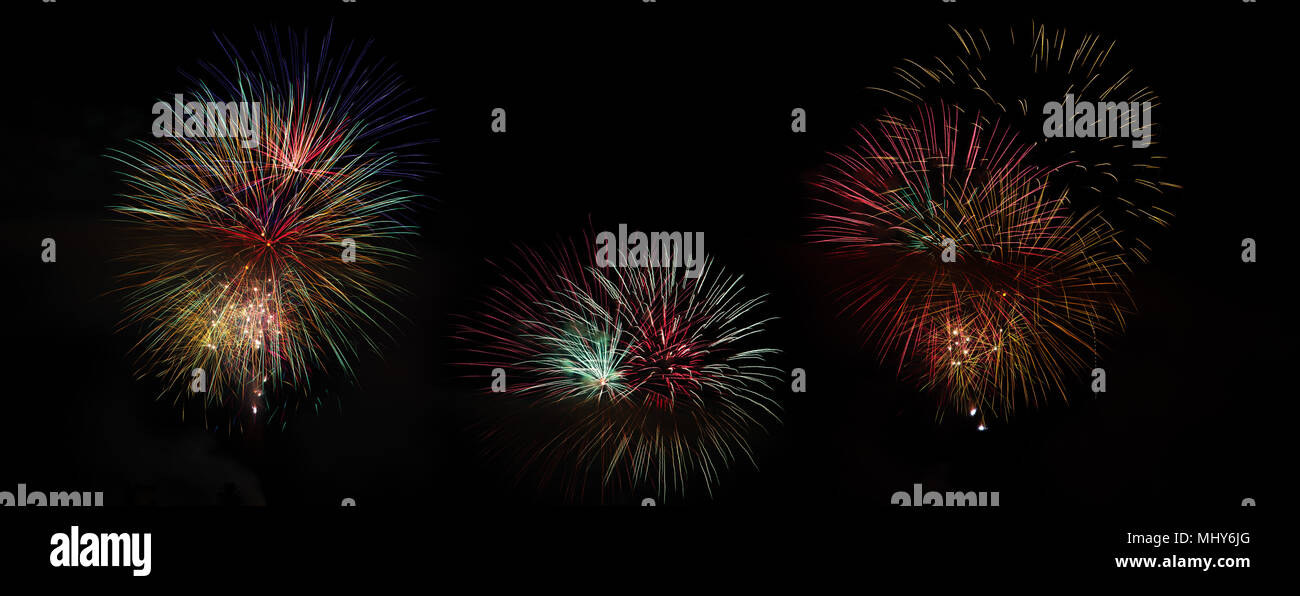 multiple fireworks on dark background Stock Photo - Alamy