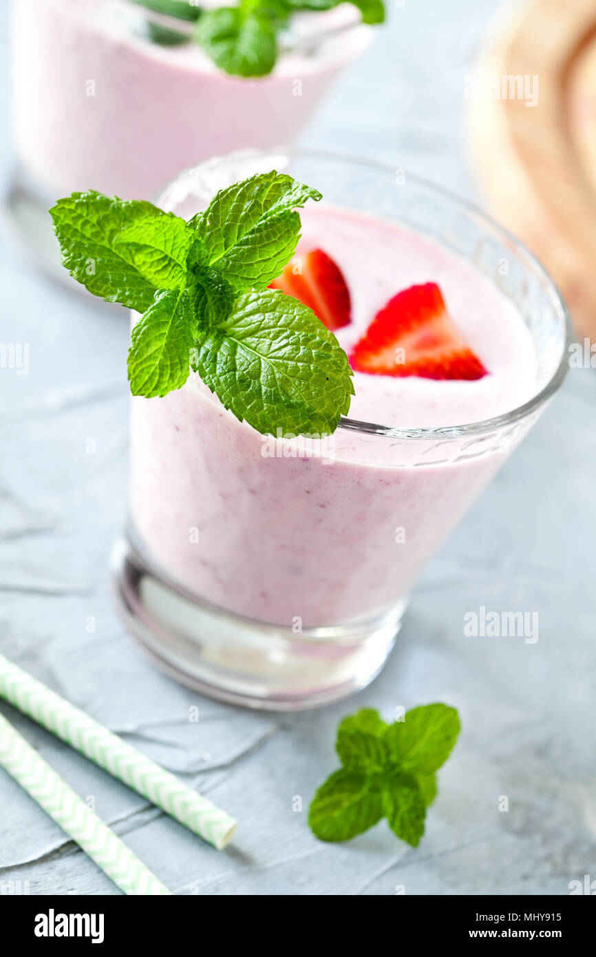 Glass of sweet and refreshing strawberry milkshake Stock Photo - Alamy