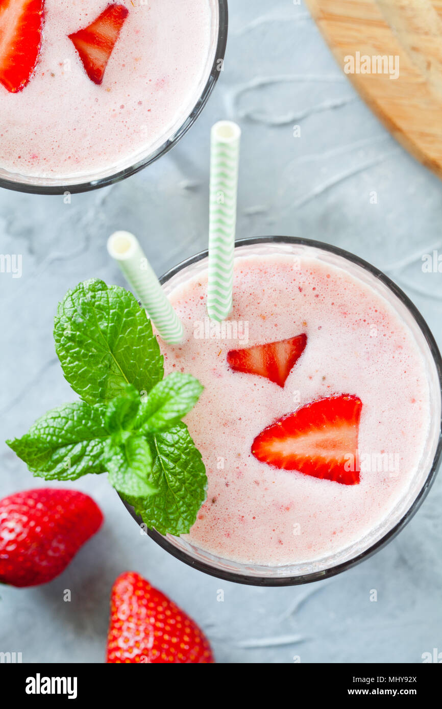 Glass of sweet and refreshing strawberry milkshake Stock Photo - Alamy