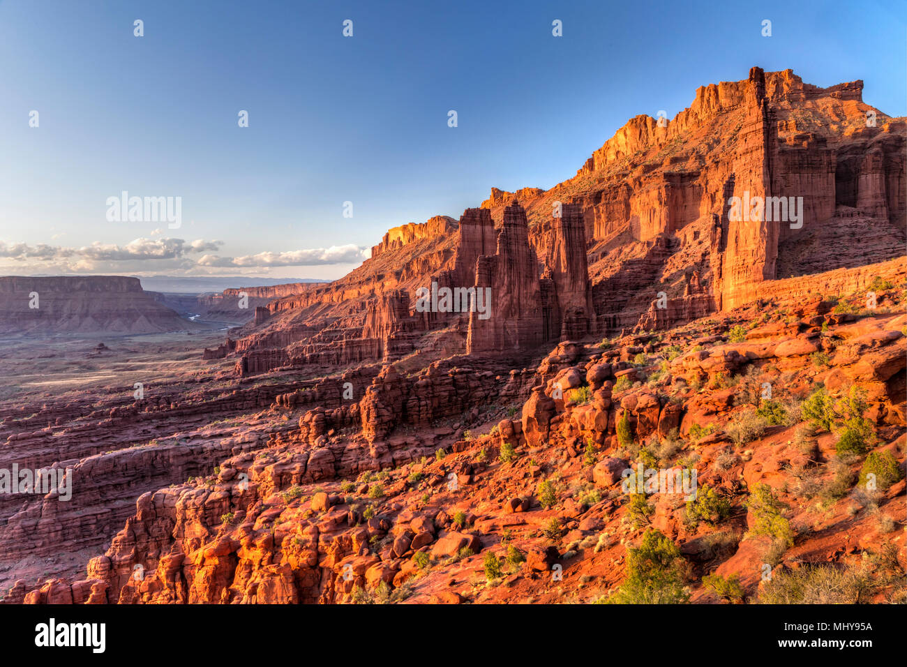 Fisher Towers rock formations rise above the Colorado River in ...