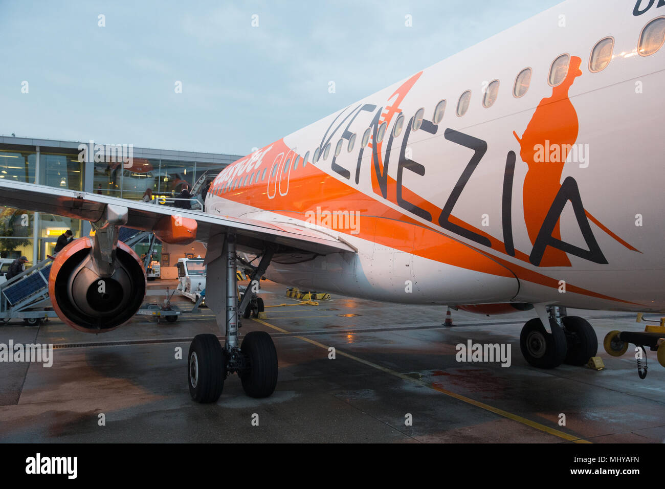 Passengers boarding an Easyjet flight at Schiphol Airport in Amsterdam ...