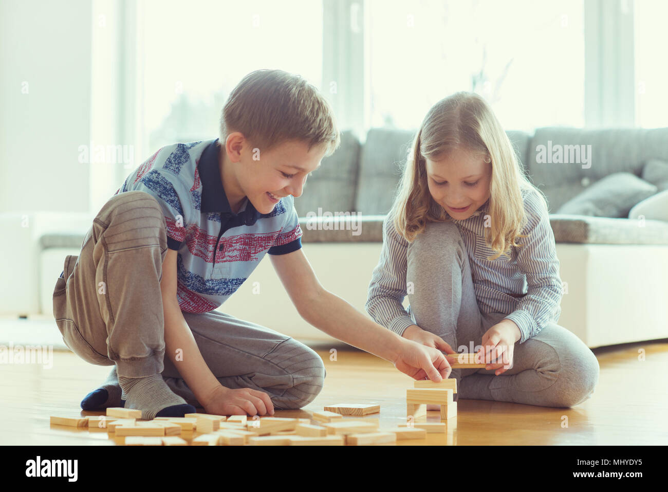 Kids brother sister joyfully play hi-res stock photography and images ...