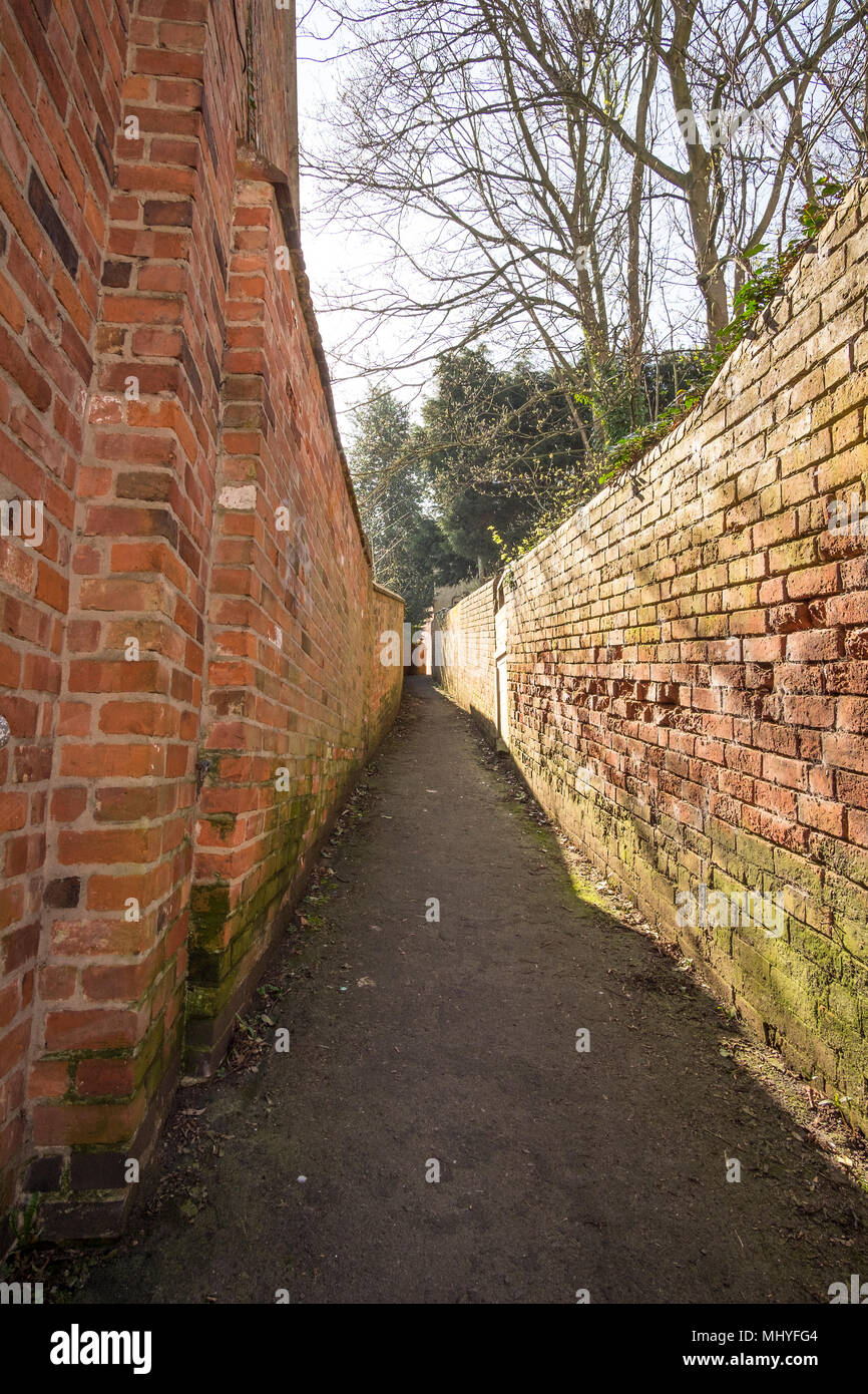 High walled alleyway in Castle Donington, East Midlsnds, UK Stock Photo ...