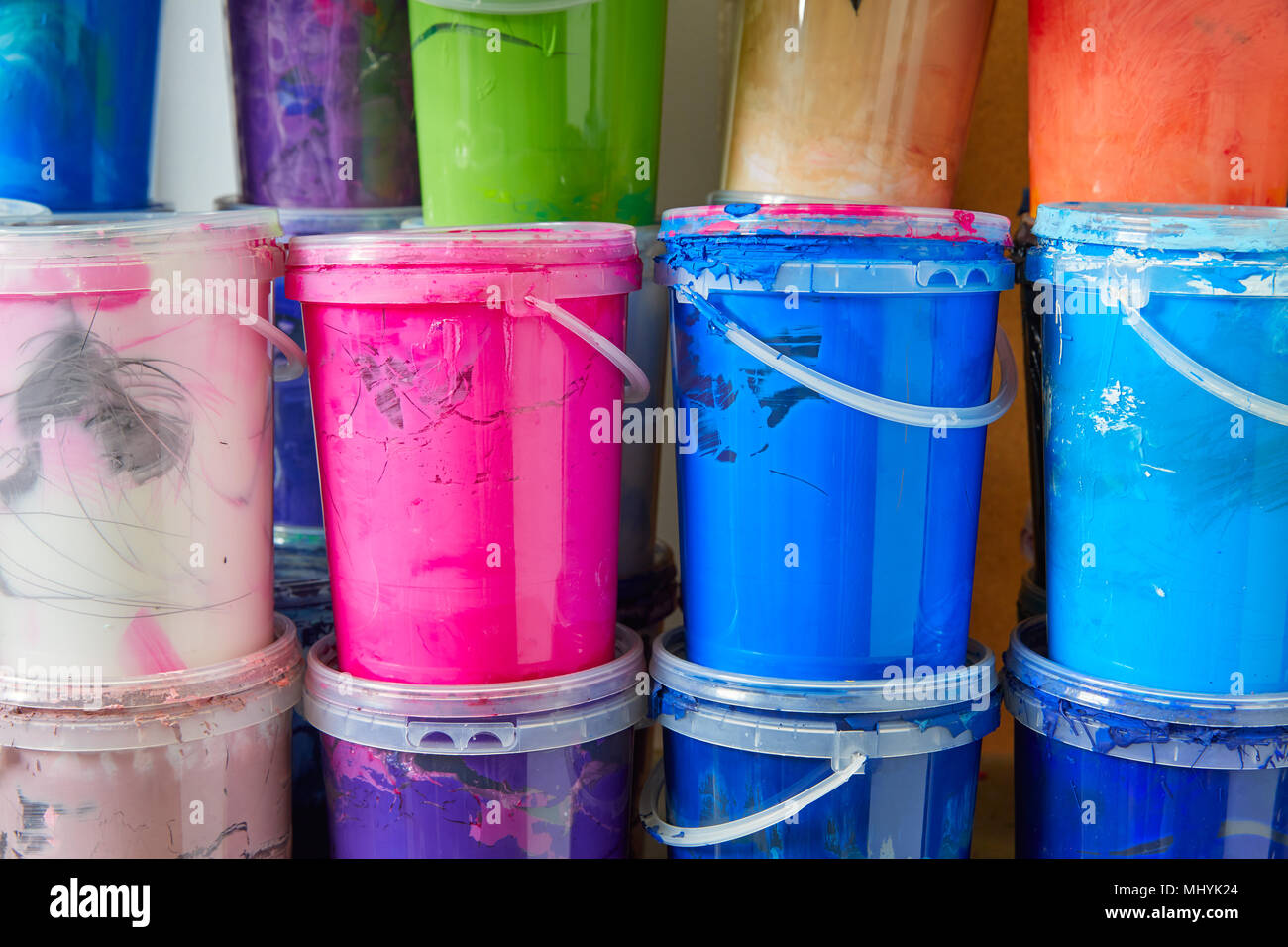 Colorful ink paint bottles in a row stacked in a print factory Stock ...