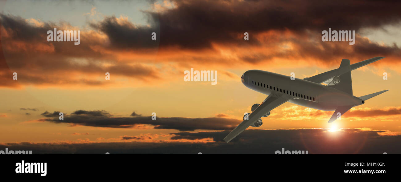 Commercial airplane with four engines flying on sunset or sunrise sky ...