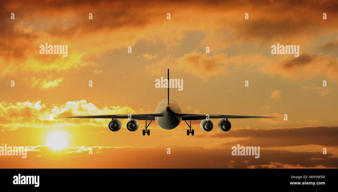 Commercial airplane with four engines flying on sunset or sunrise sky ...