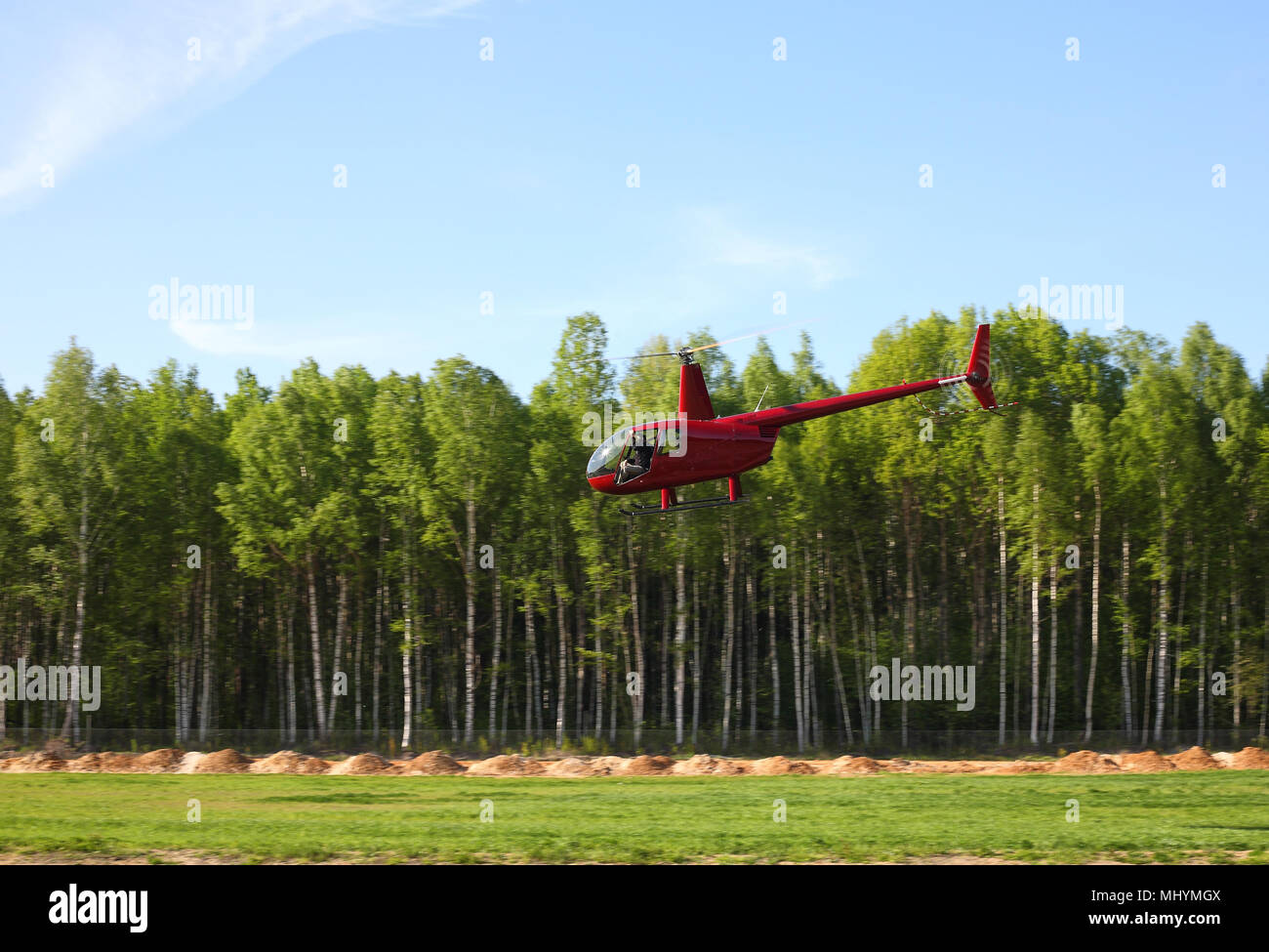 The aircraft - the small red helicopter at competitions makes flight at ...