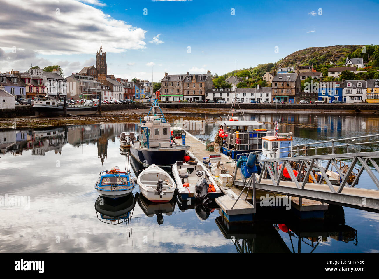 Moored boats at Tarbert Harbour. Tarbet, a small fishing town and ferry ...