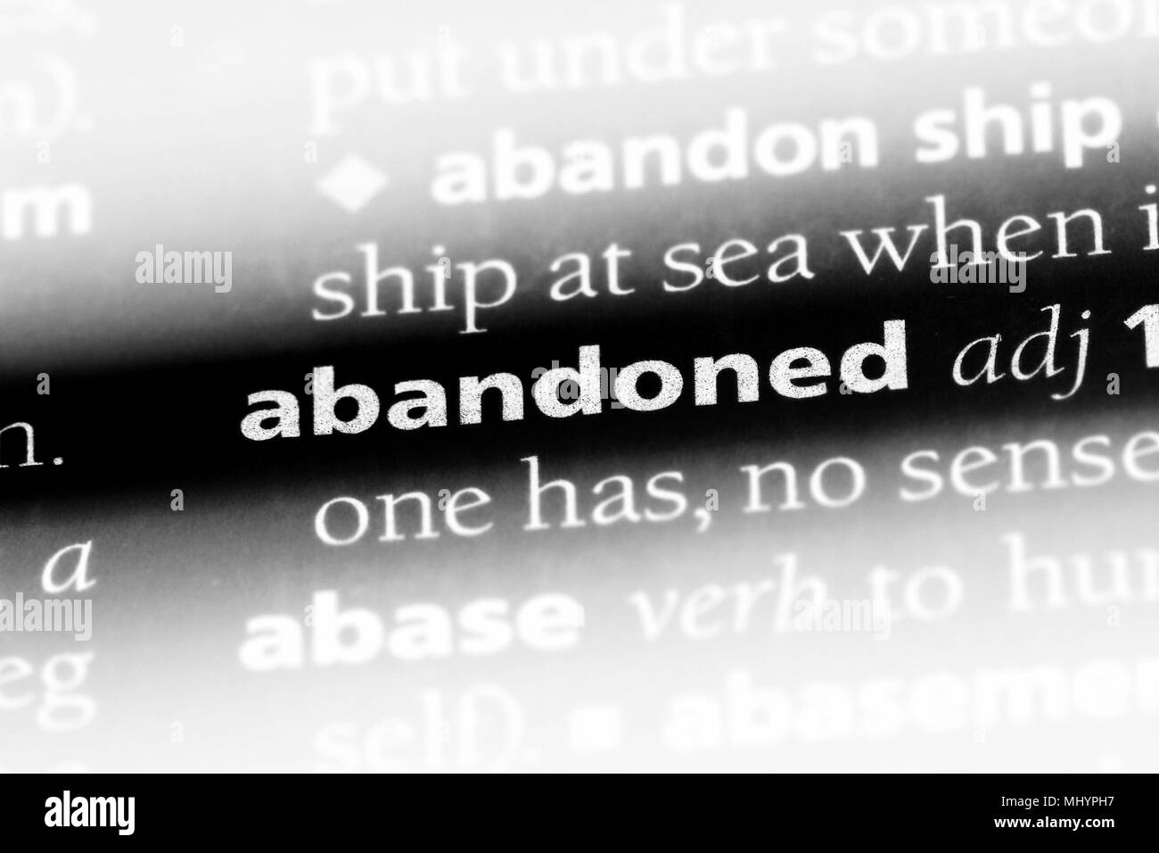 abandoned word in a dictionary. abandoned concept Stock Photo - Alamy