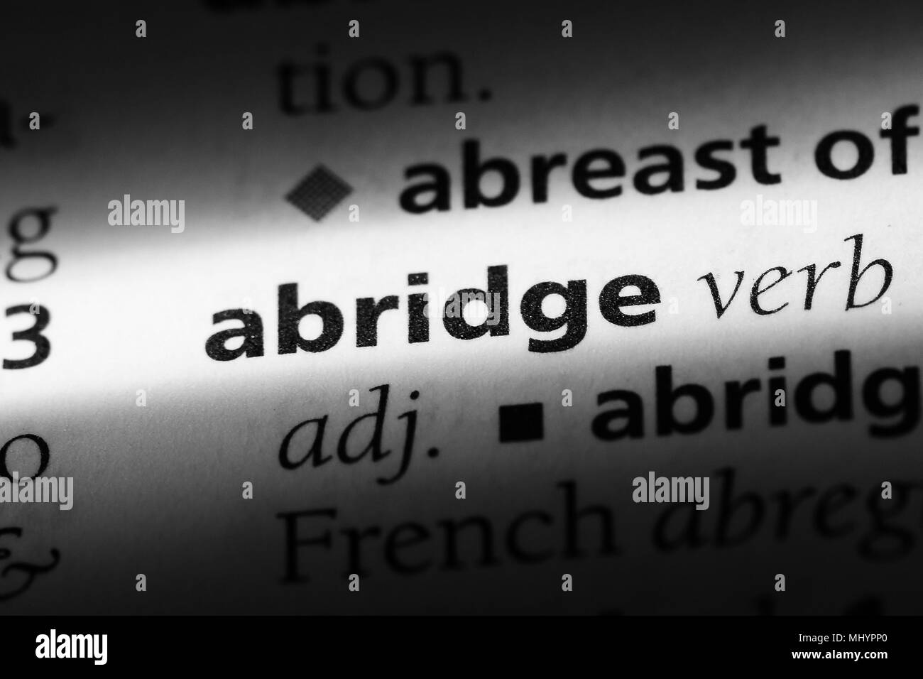abridge word in a dictionary. abridge concept Stock Photo - Alamy