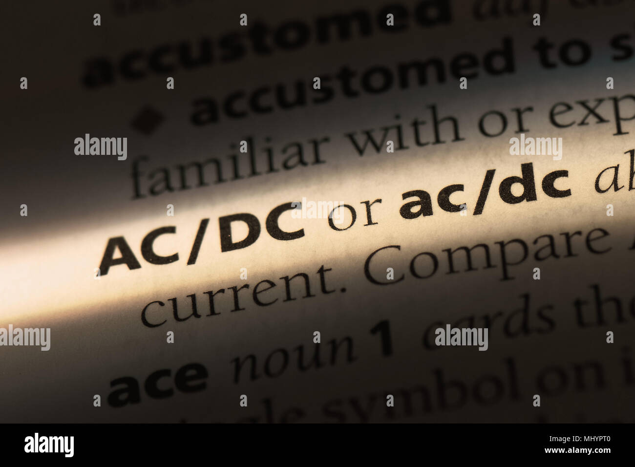 AC:DC word in a dictionary. AC:DC concept Stock Photo - Alamy