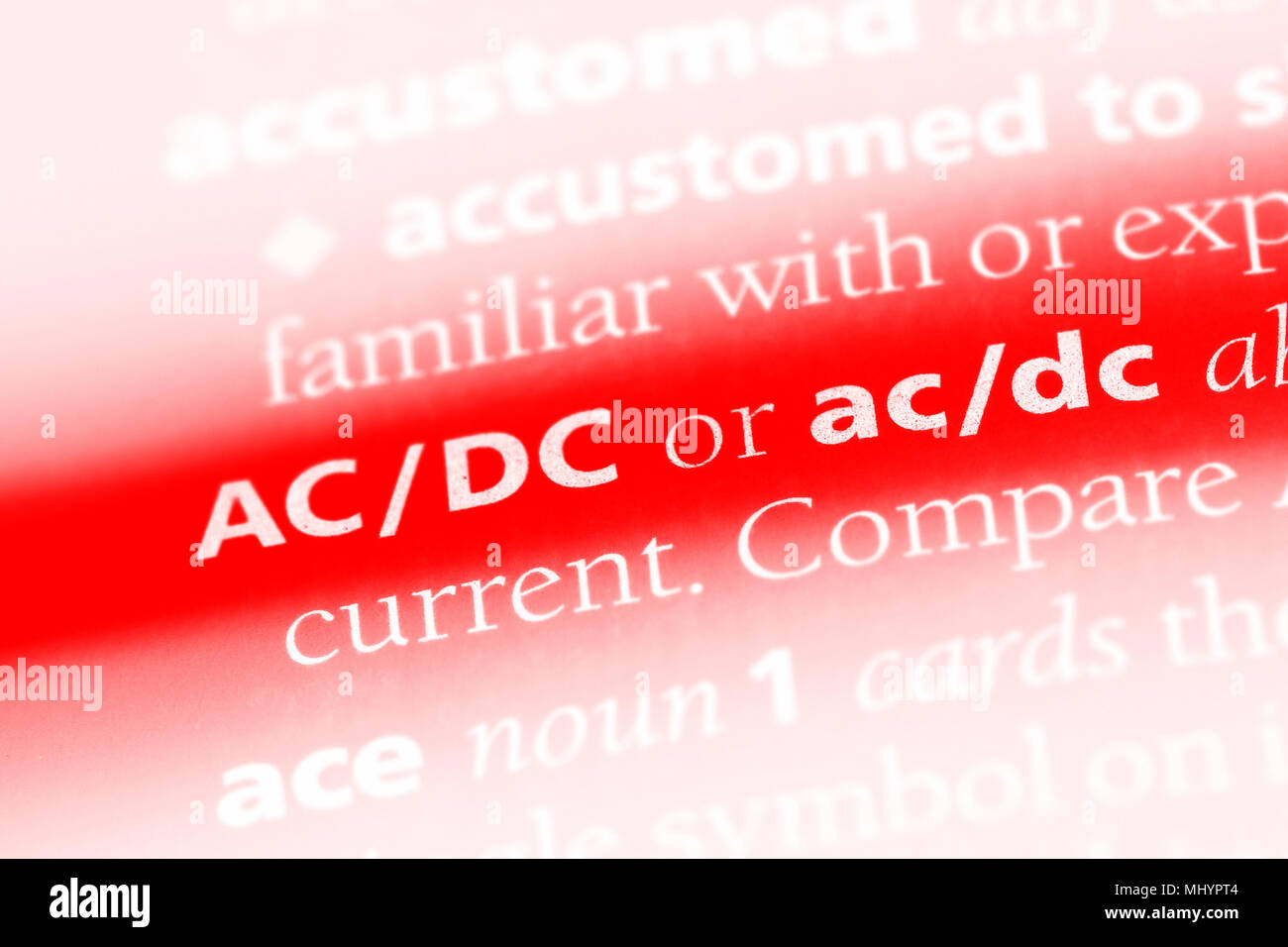 AC:DC word in a dictionary. AC:DC concept Stock Photo - Alamy