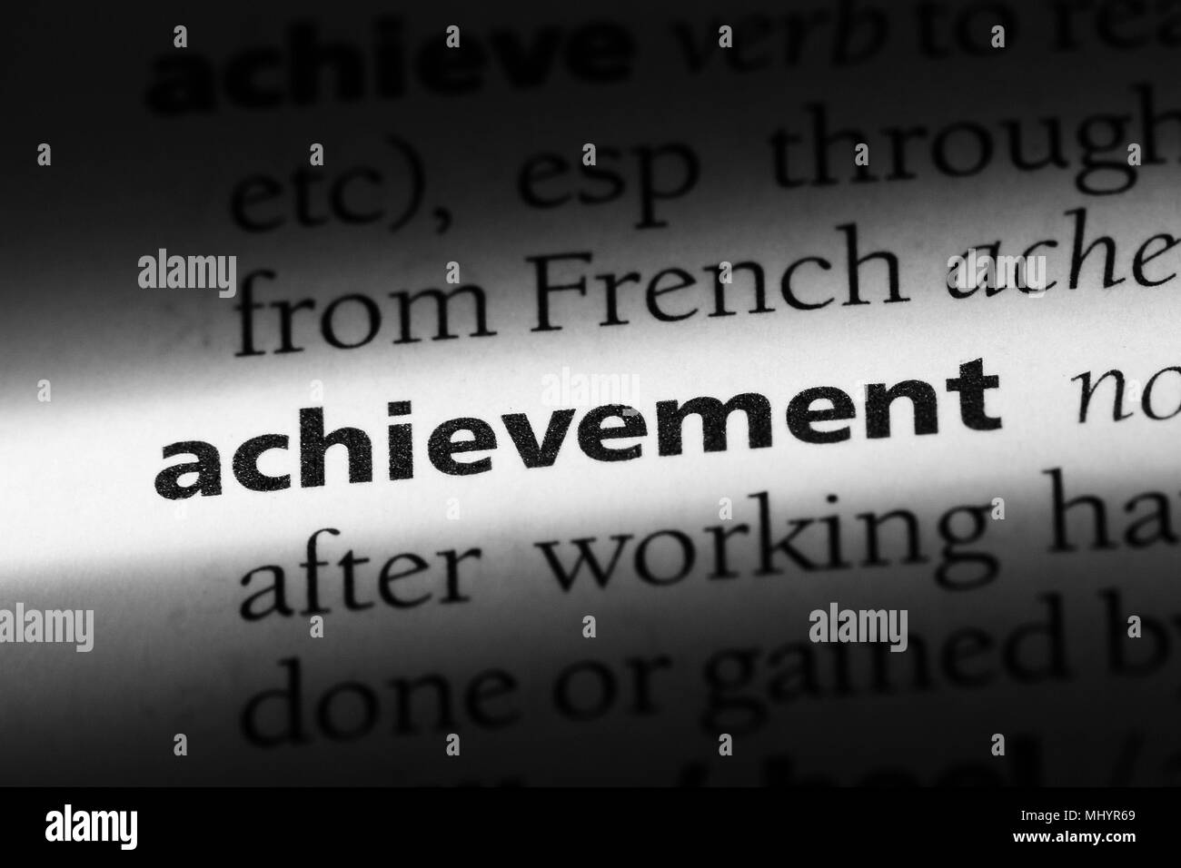 achievement word in a dictionary. achievement concept Stock Photo - Alamy