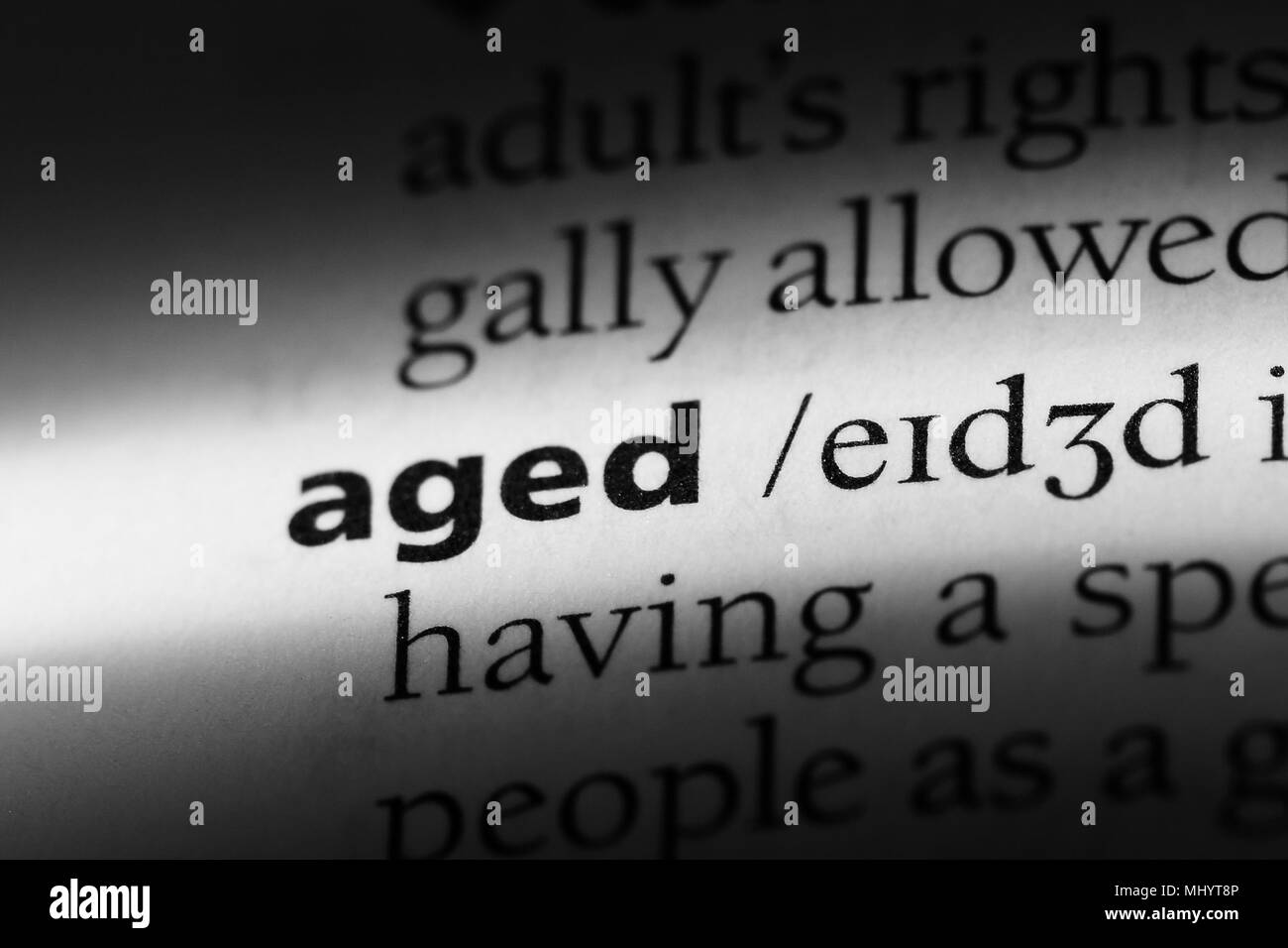 aged word in a dictionary. aged concept Stock Photo - Alamy