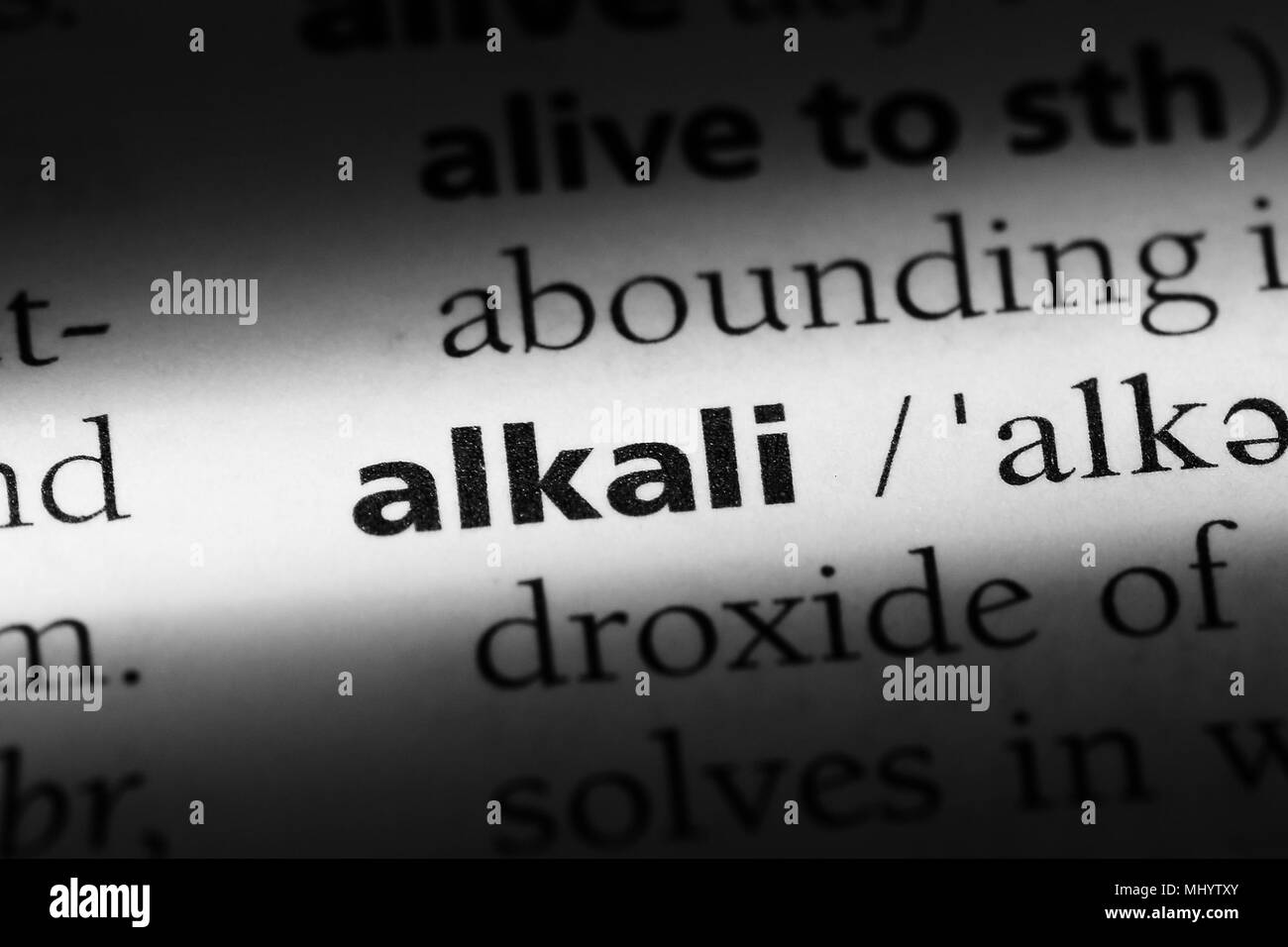 alkali word in a dictionary. alkali concept Stock Photo - Alamy