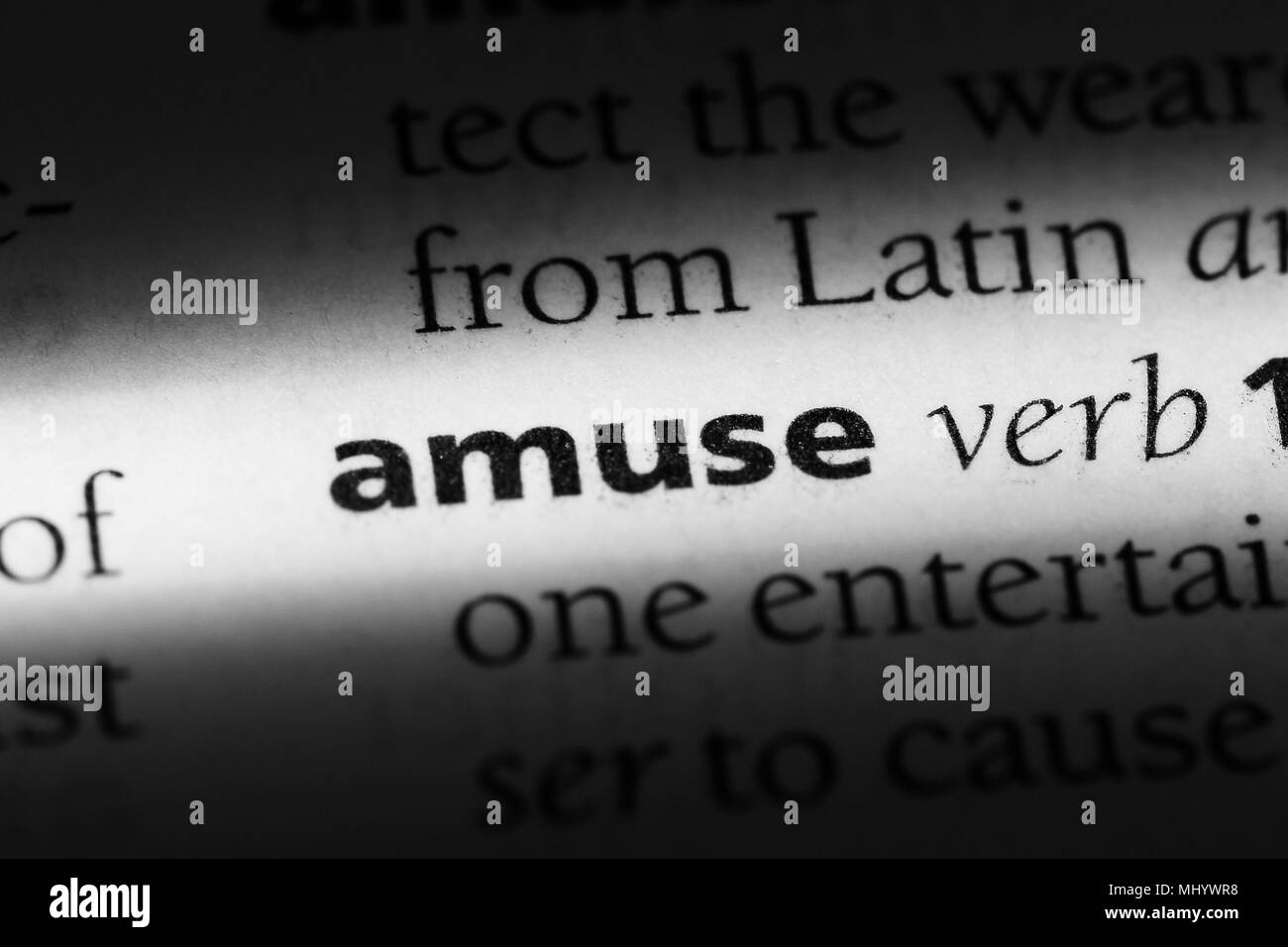 amuse word in a dictionary. amuse concept Stock Photo - Alamy