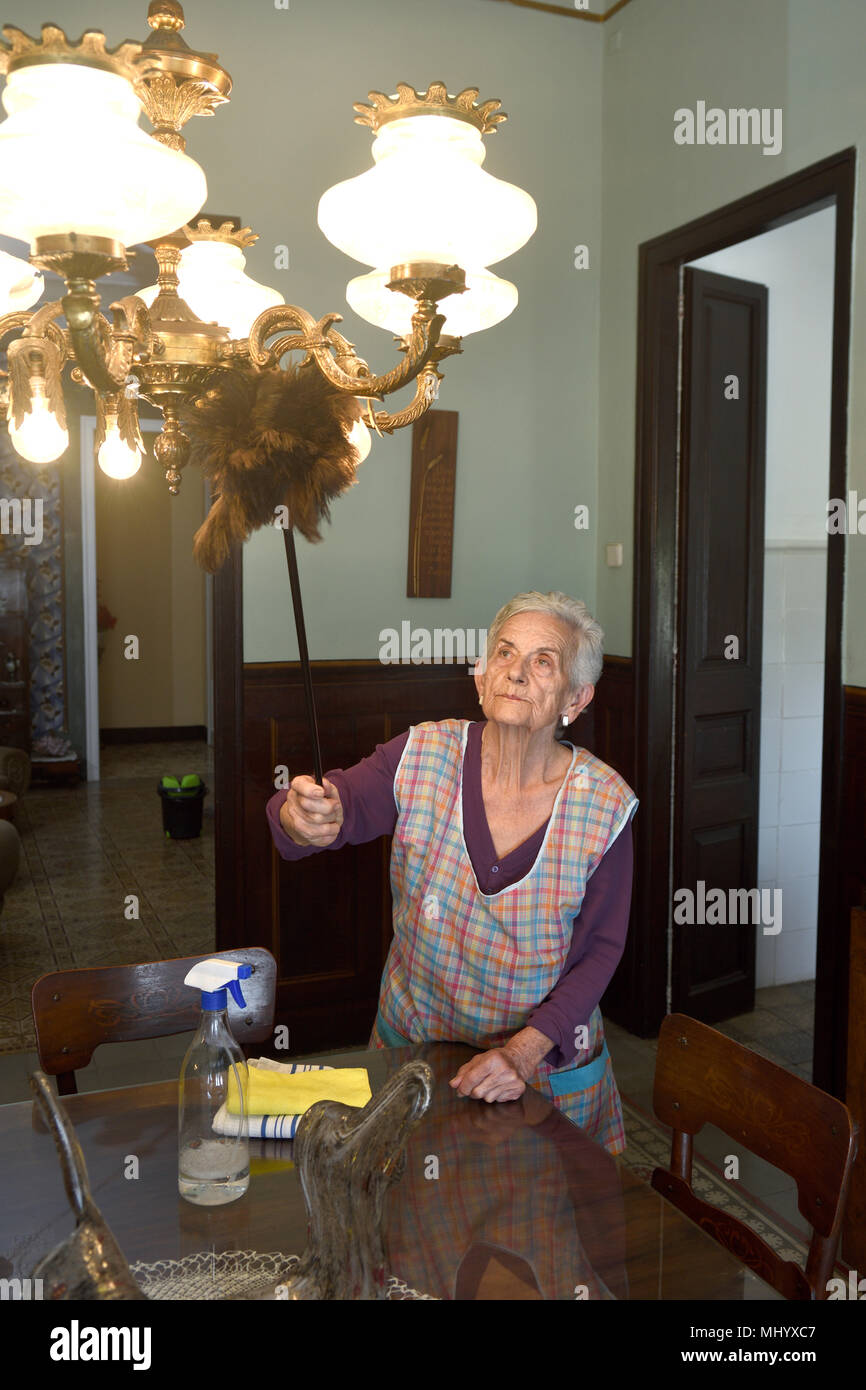 Elderly lady dusting hi-res stock photography and images - Alamy