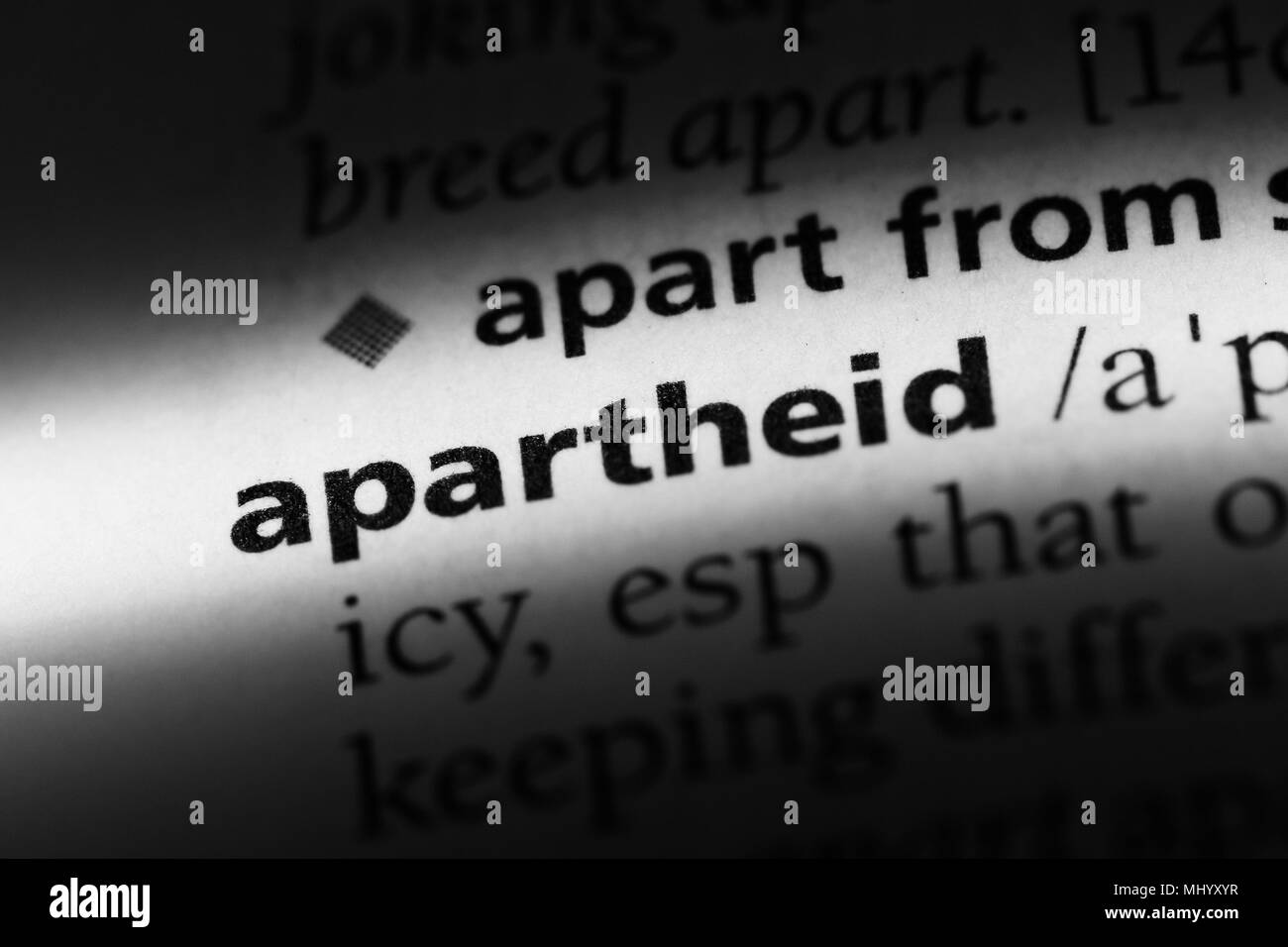 apartheid word in a dictionary. apartheid concept Stock Photo - Alamy