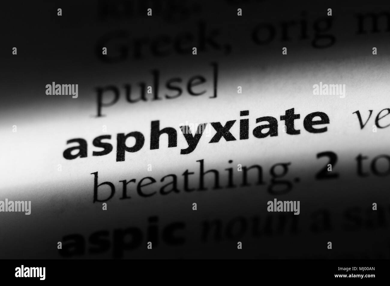 asphyxiate word in a dictionary. asphyxiate concept Stock Photo - Alamy