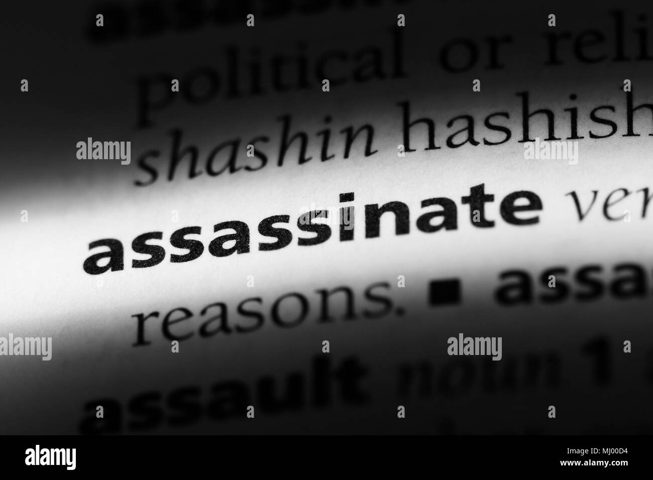 assassinate word in a dictionary. assassinate concept Stock Photo - Alamy