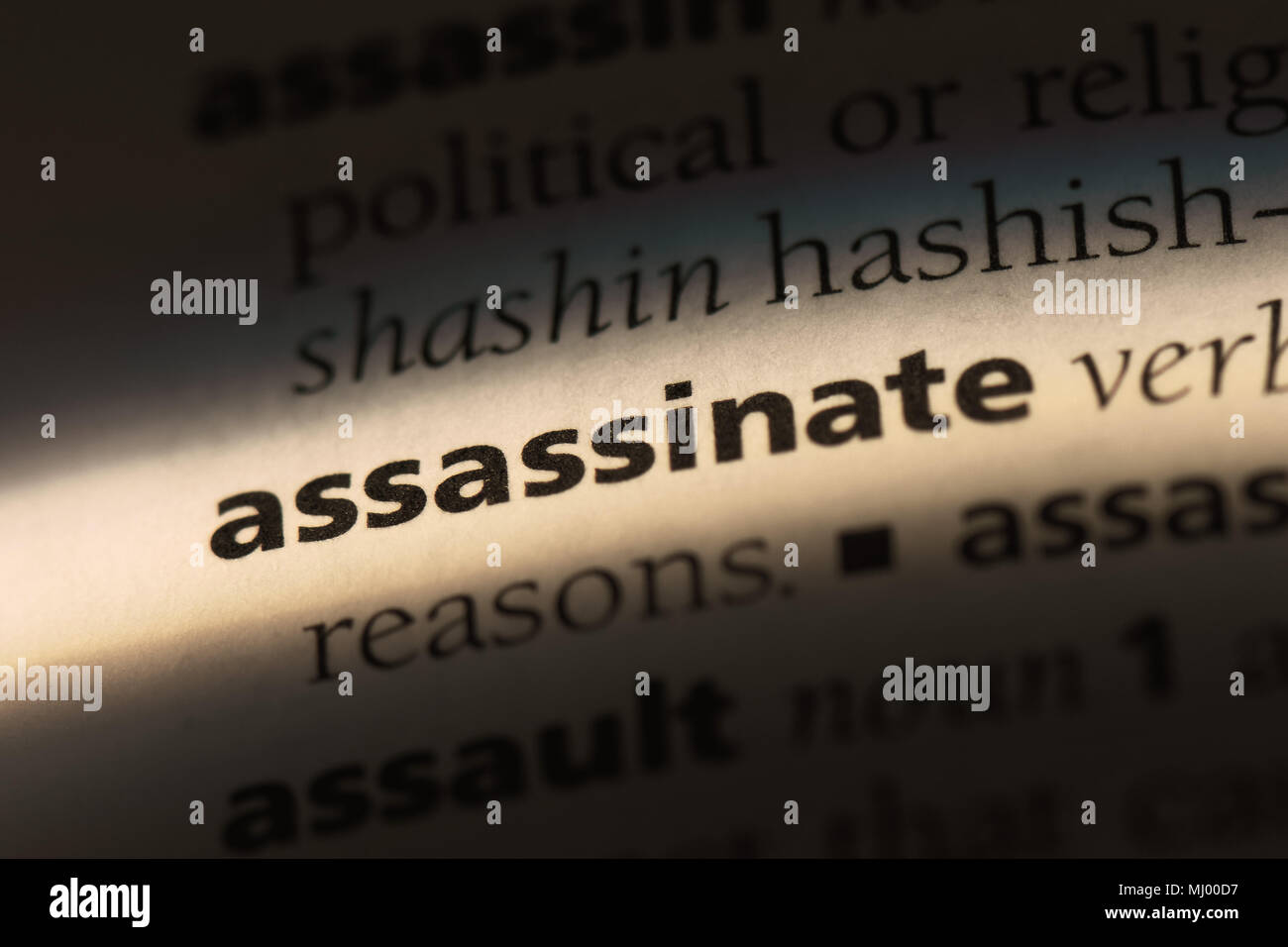 assassinate word in a dictionary. assassinate concept Stock Photo - Alamy