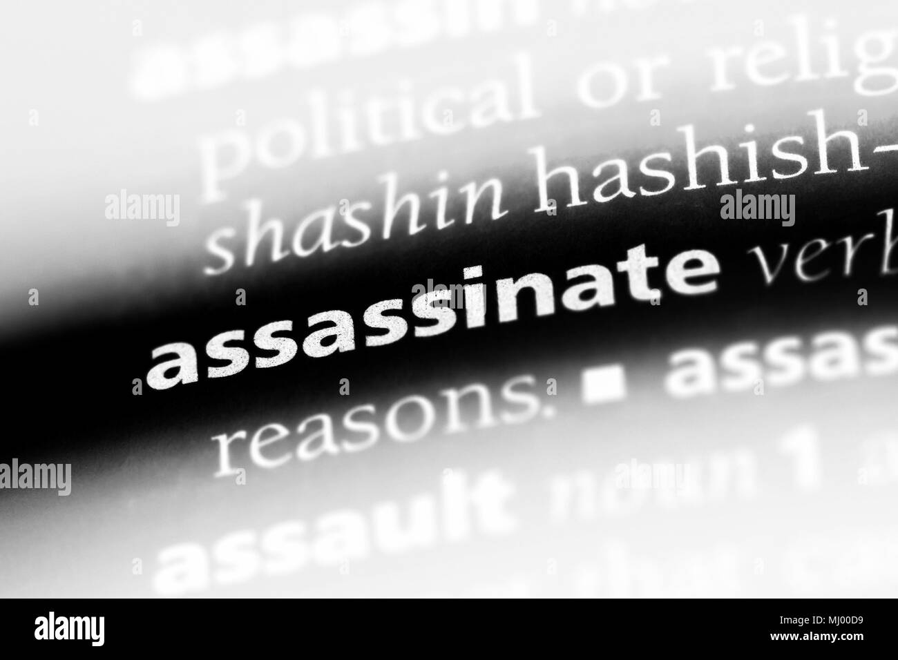assassinate word in a dictionary. assassinate concept Stock Photo - Alamy
