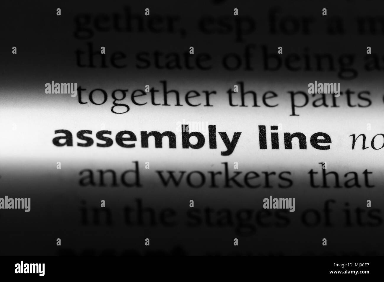 assembly line word in a dictionary. assembly line concept Stock Photo ...