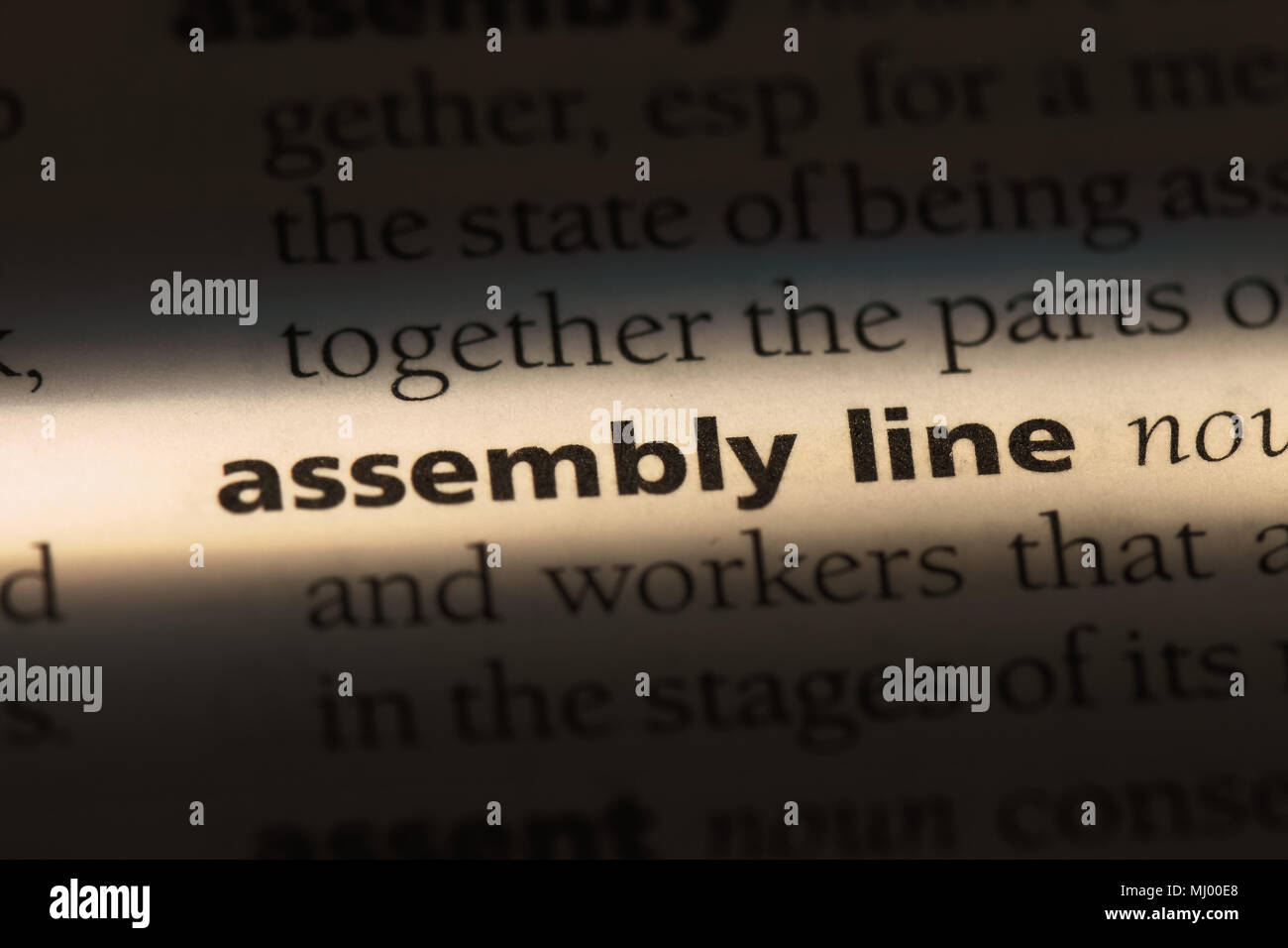 assembly line word in a dictionary. assembly line concept Stock Photo ...